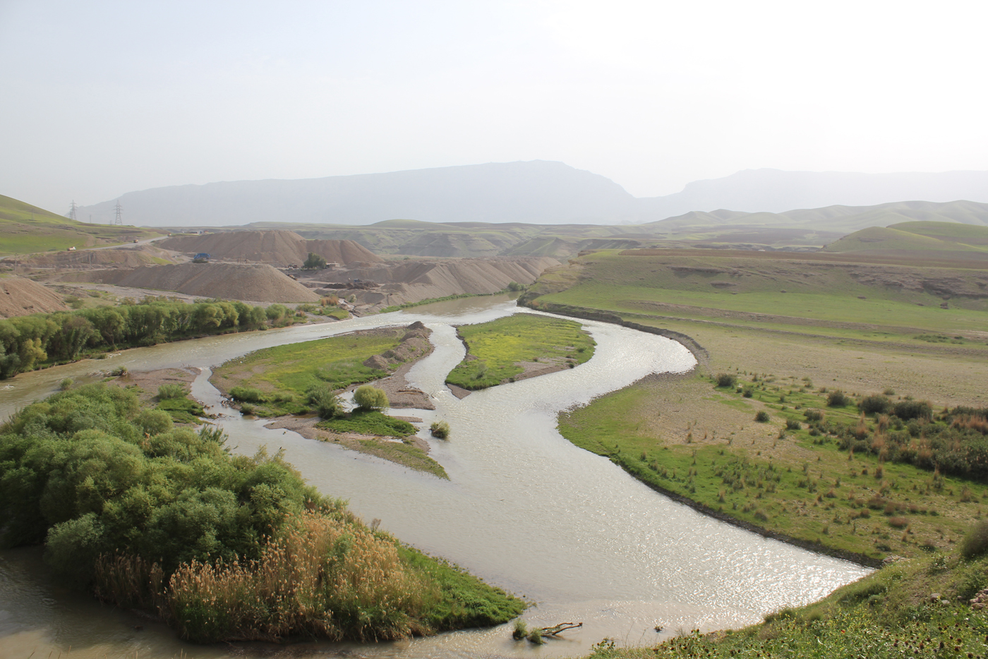 THE LAND BEHIND THE LAND BEHIND BAGHDAD: ARCHAEOLOGICAL LANDSCAPES OF ...